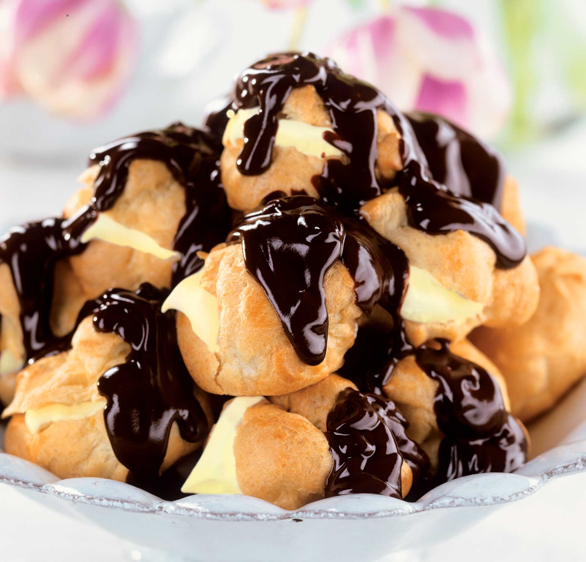Profiteroles with ganache sauce and chantilly cream